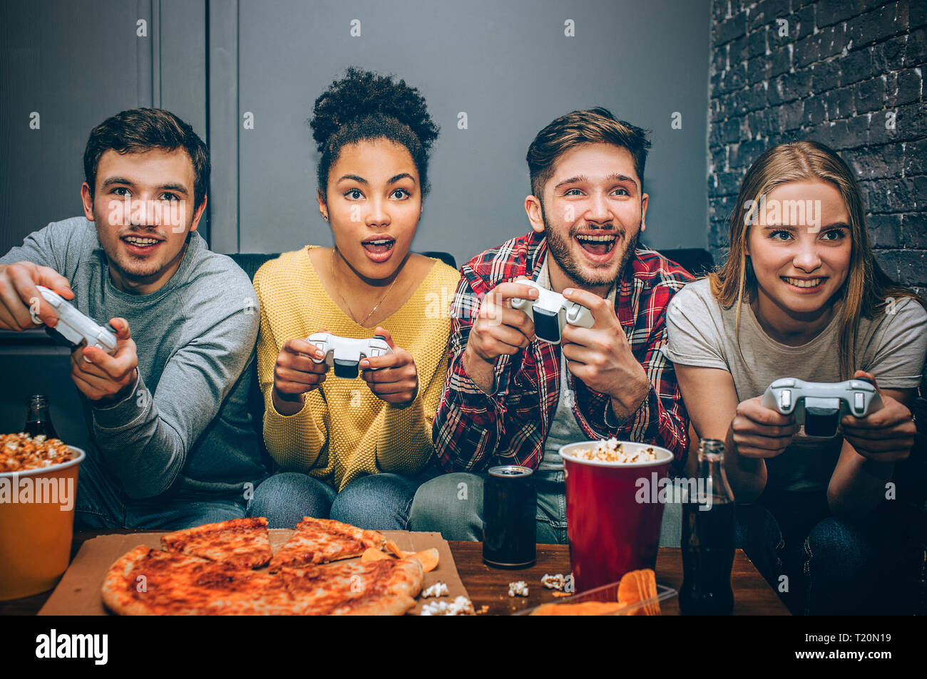 Friends intensive playing hi-res stock photography and images - Alamy