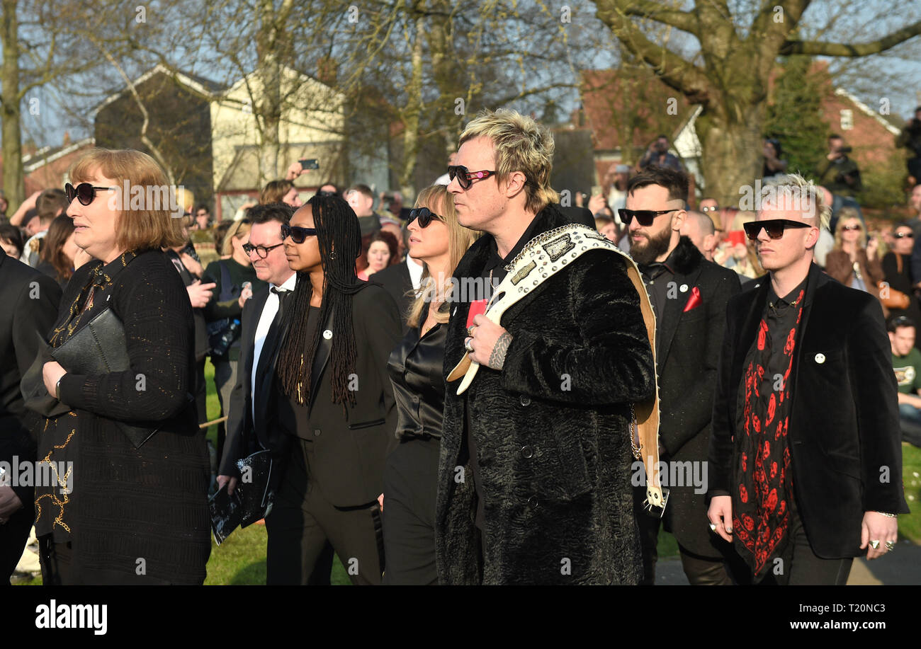 Bandmate Liam Howlett (centre) arrives the funeral of Keith Flint in ...