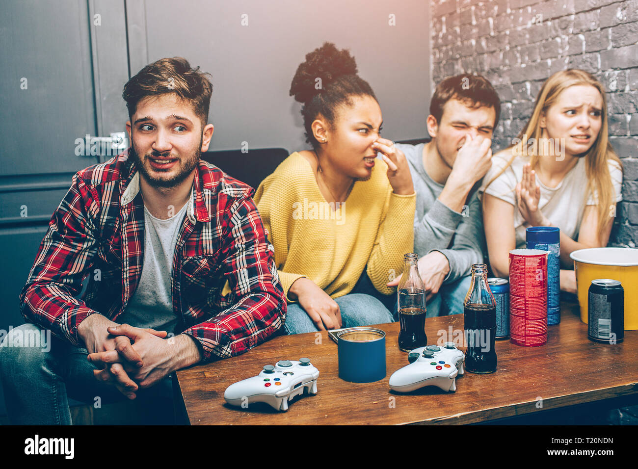 Three of four people on this photo have smelled the bad smell. THey ...