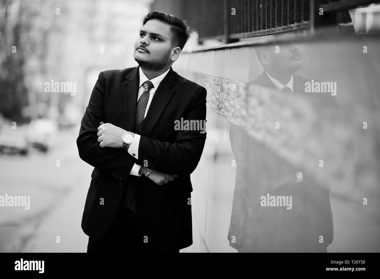 Confident attractive businessman wearing Black and White Stock Photos ...