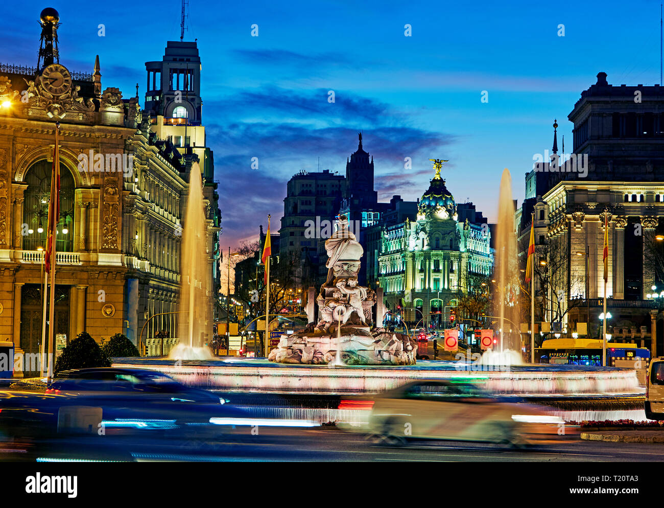 Plaza de la Cibeles (Cibeles Square) illuminated at dusk with the ...