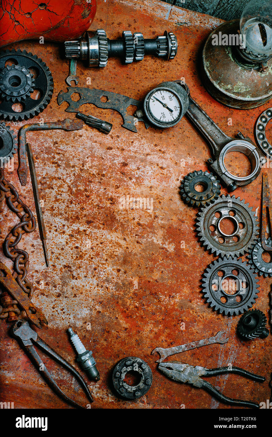 Motorcycle tools, equipment and repair, old chain, gear on vintage ...