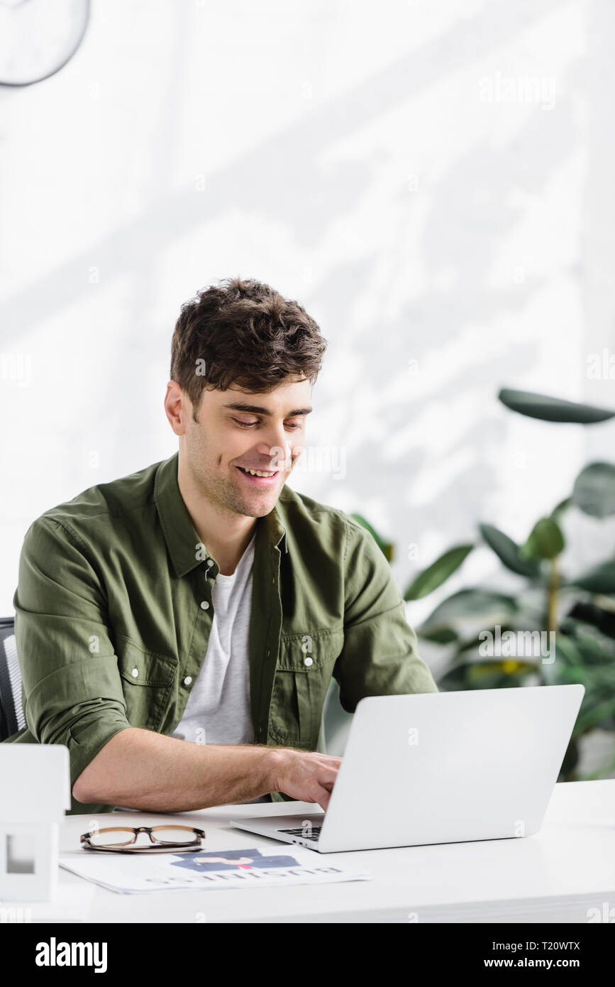 Excited architect laughing workplace hi-res stock photography and ...