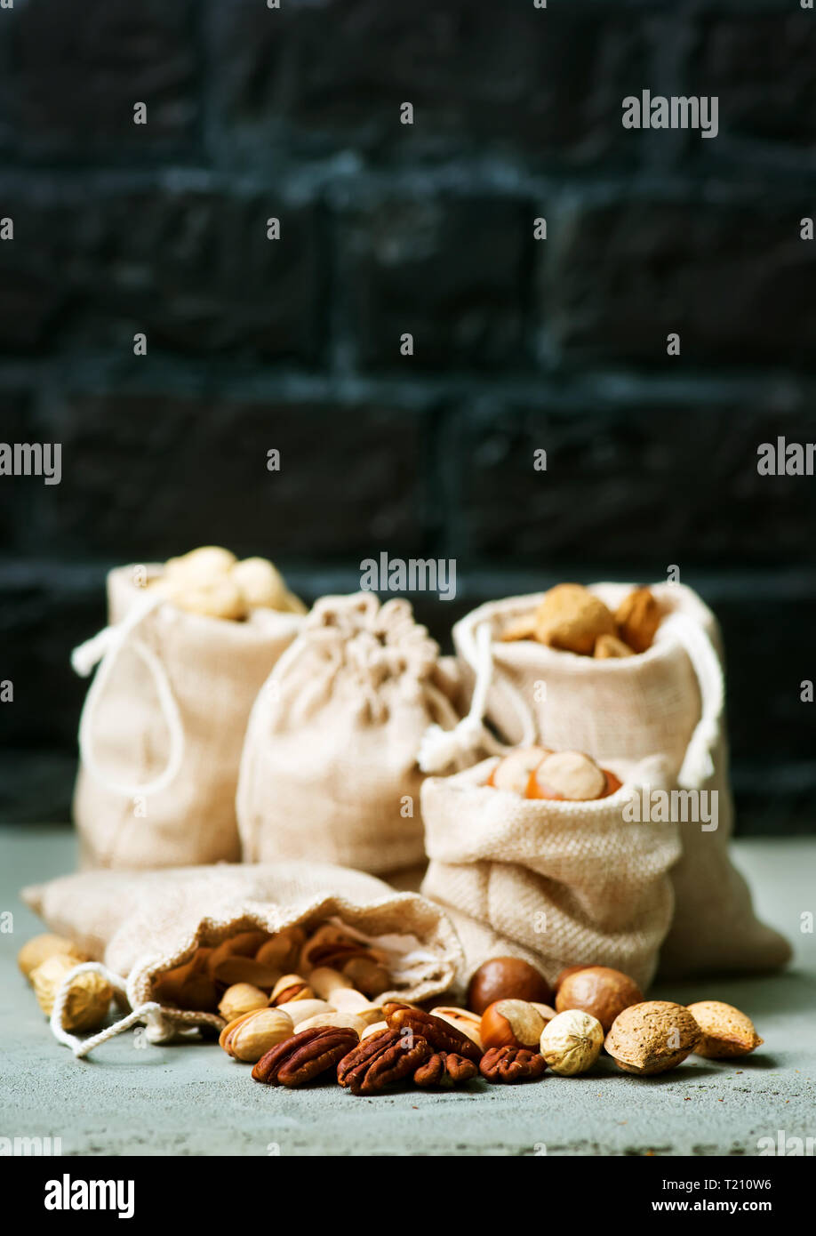 nuts on a table, different kind of nuts Stock Photo - Alamy