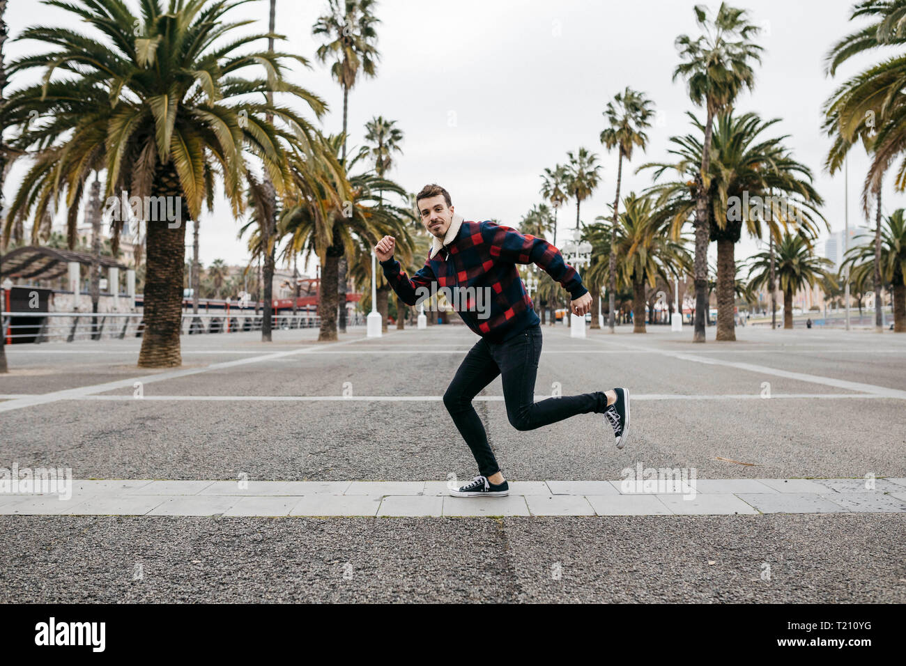 Man balancing on one foot hi-res stock photography and images - Alamy