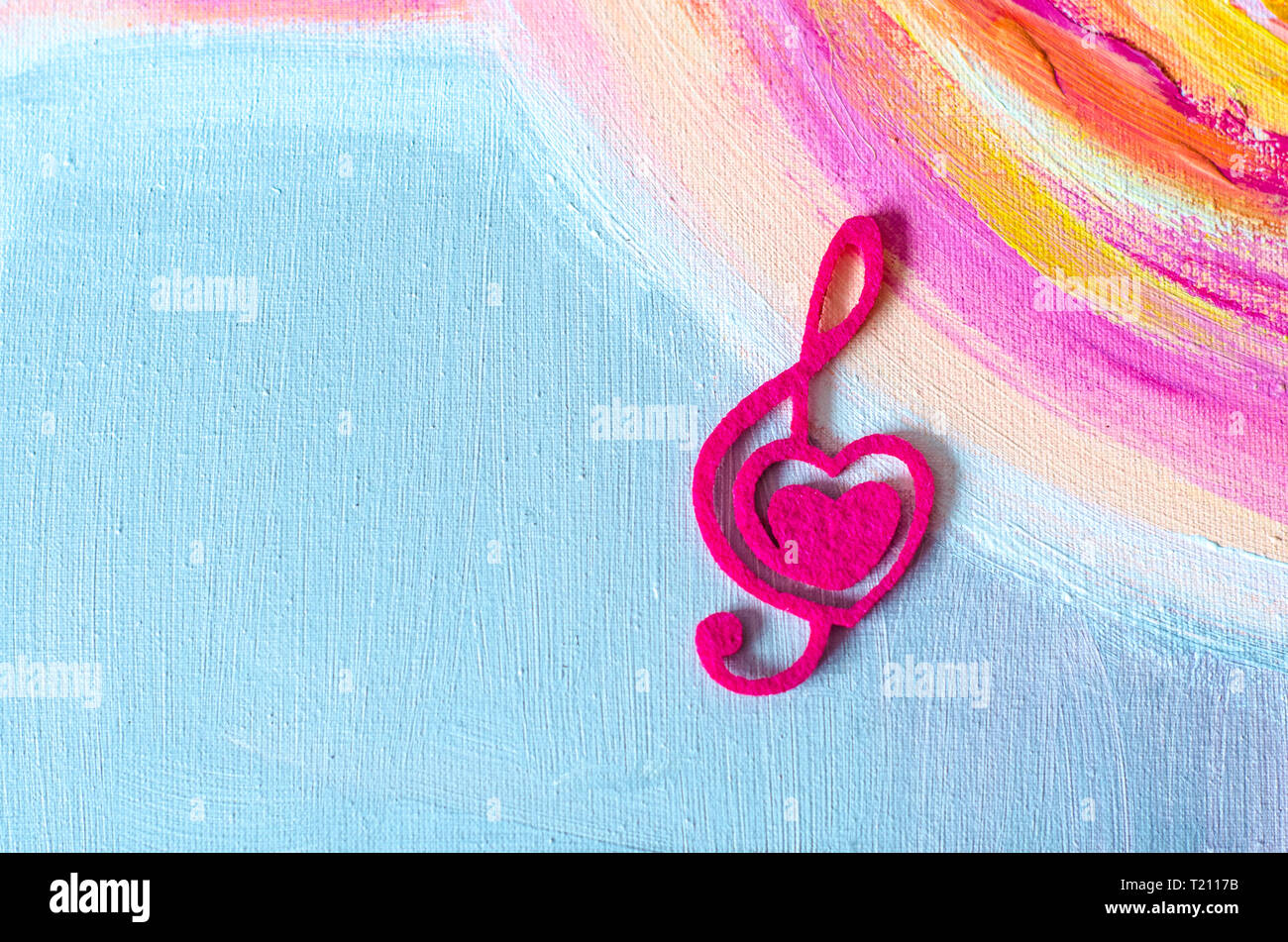 Treble clef with a heart on a beautiful background.Acrylic painting ...