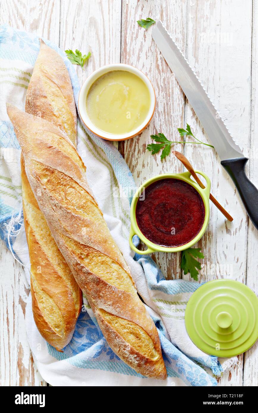 Fresh crispy French baguette with chicken liver pate and berry ...