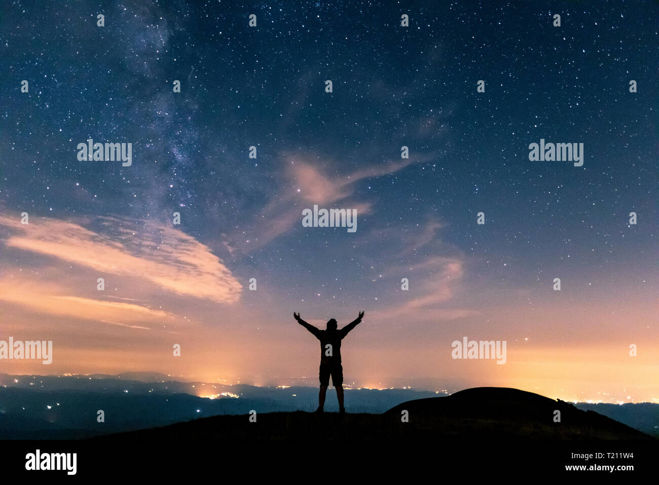 Man Looking Up At The Stars