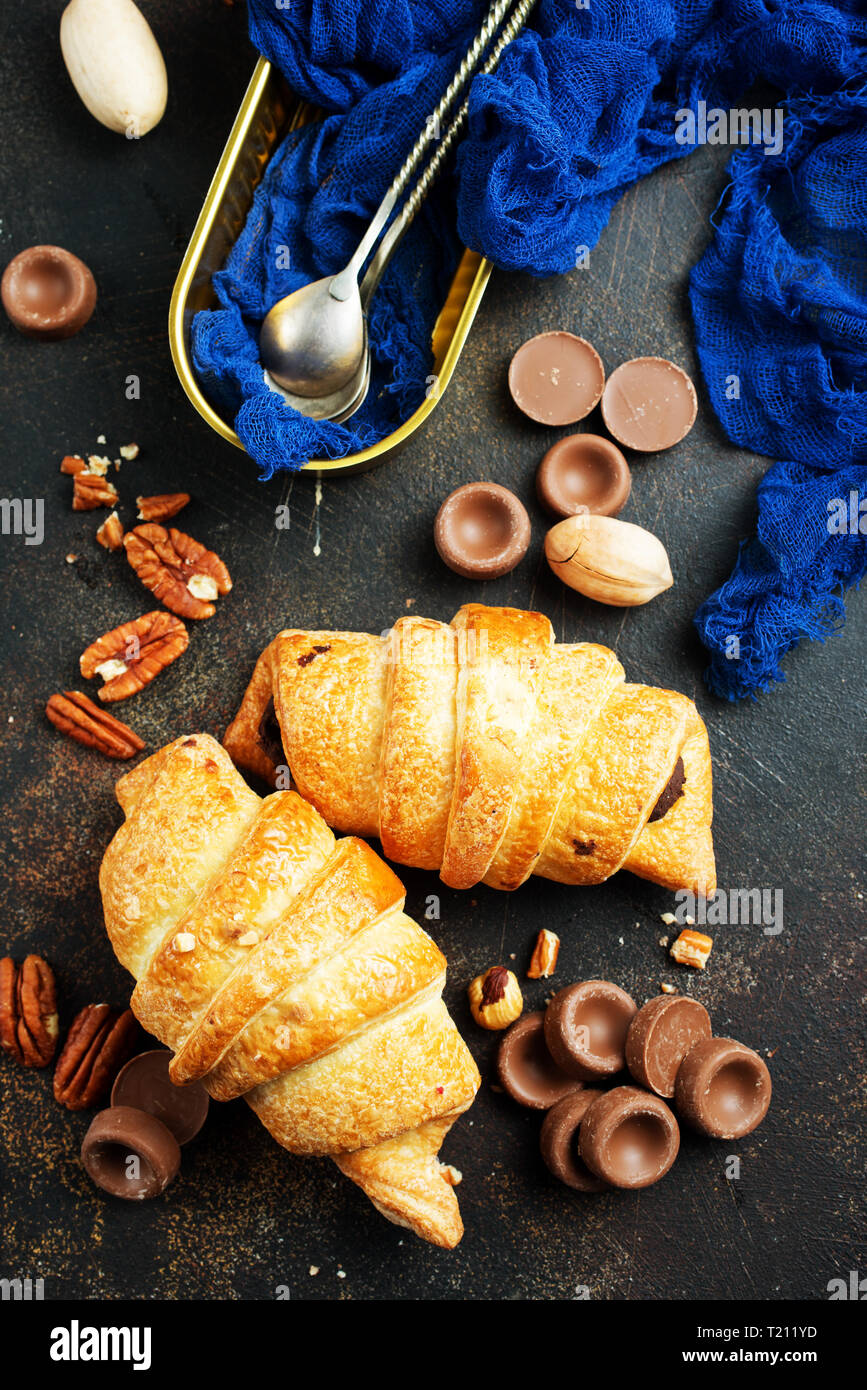 sweet croissant with chocolate and nuts, croissant for breakfast Stock ...