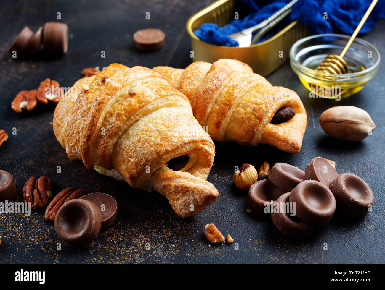 sweet croissant with chocolate and nuts, croissant for breakfast Stock ...