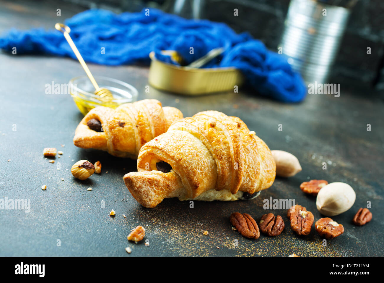 sweet croissant with chocolate and nuts, croissant for breakfast Stock ...