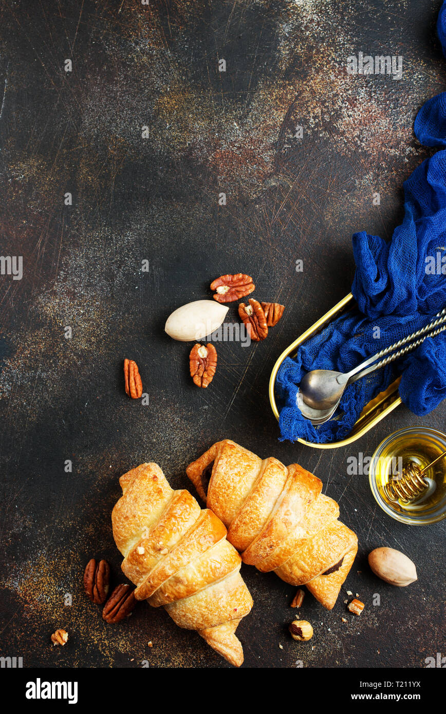 sweet croissant with chocolate and nuts, croissant for breakfast Stock ...