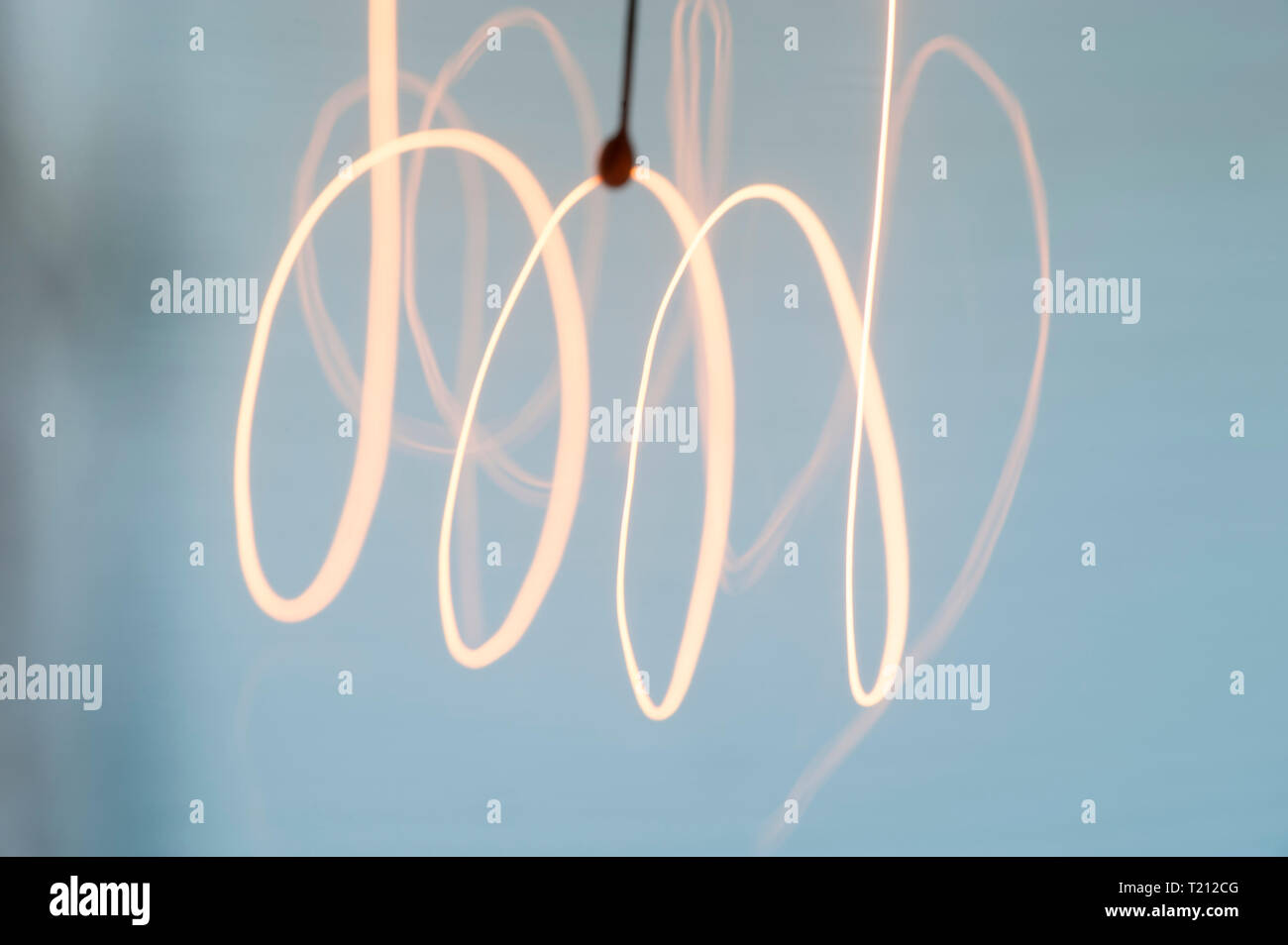 Light bulb with glowing filament Stock Photo - Alamy