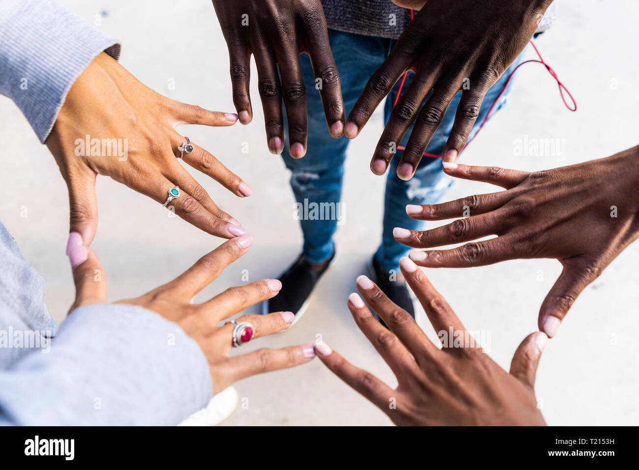 Friends touching with fingers of their hands, making a star shape Stock ...