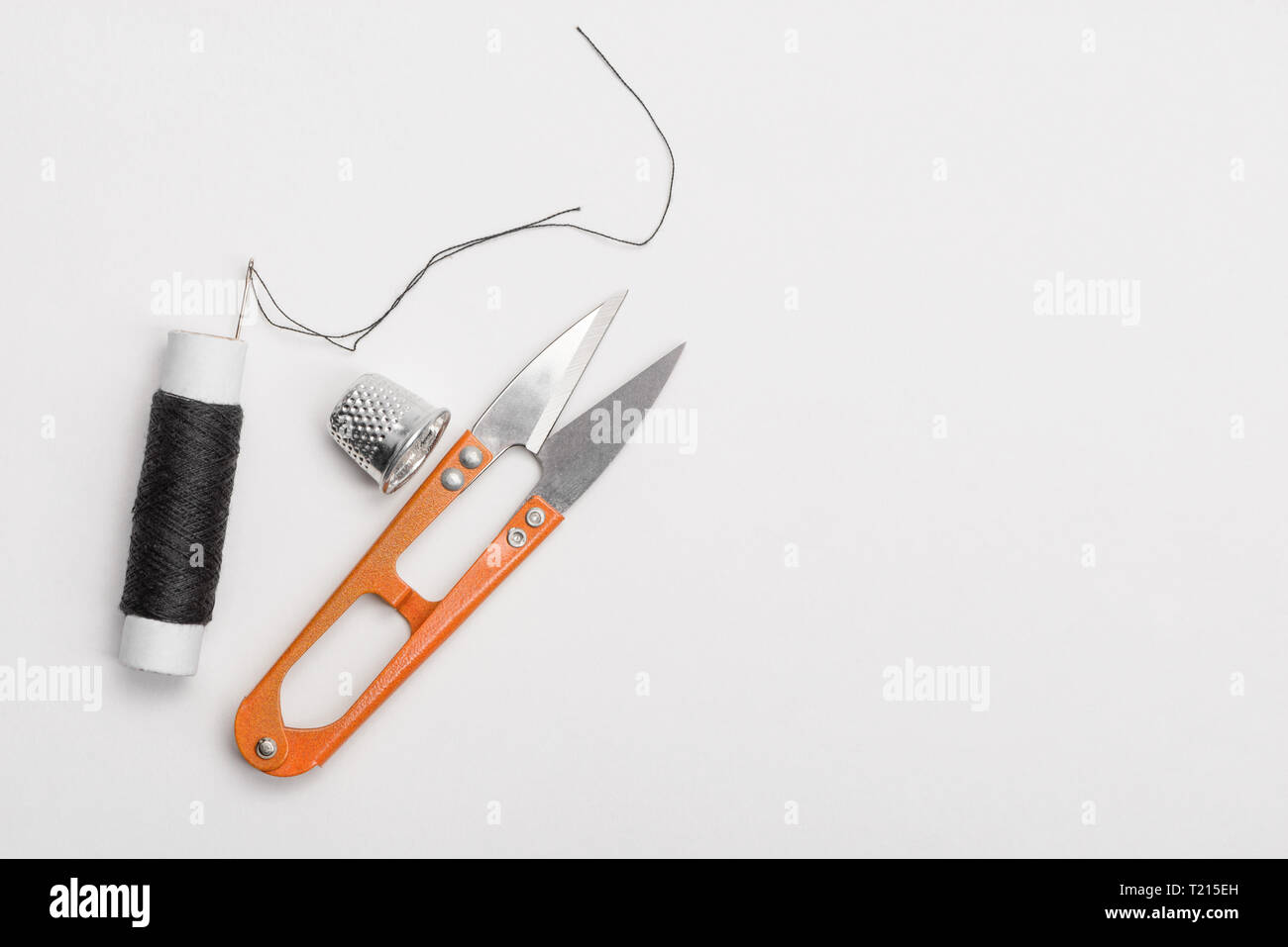 Thread clipper hi-res stock photography and images - Alamy