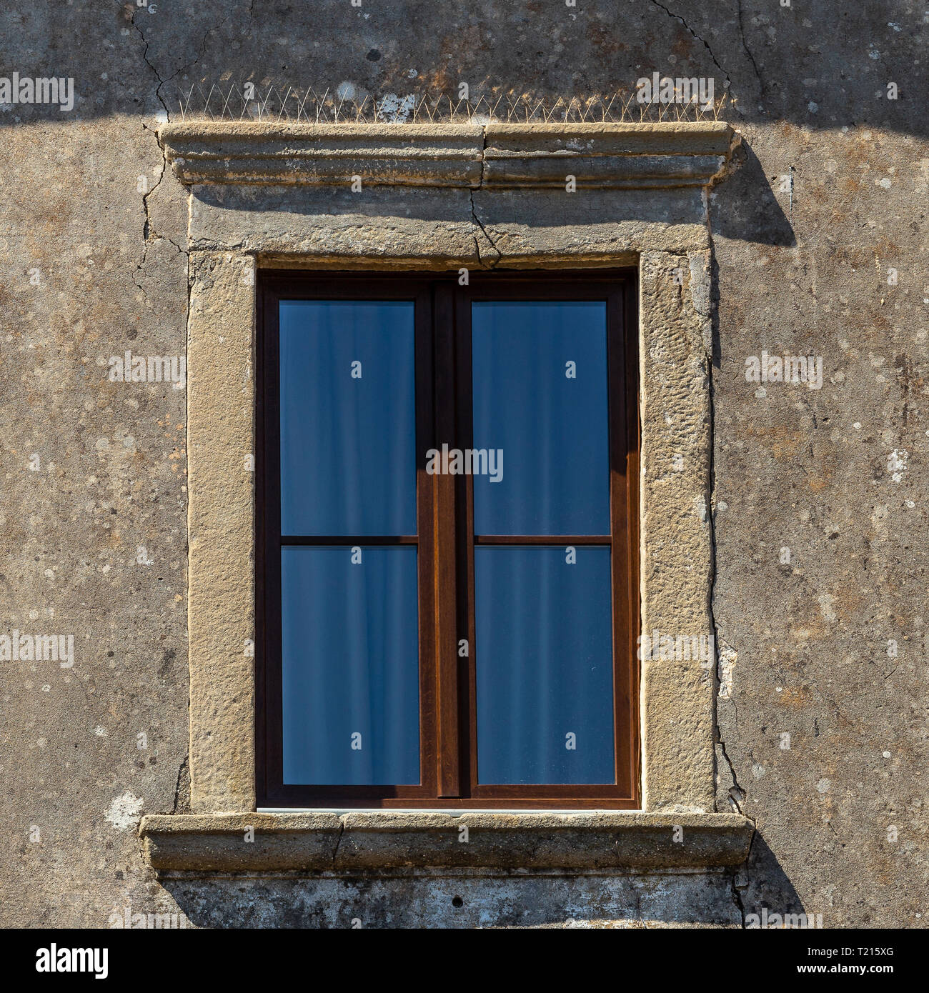 The ancient window on stone wall, for background Stock Photo - Alamy