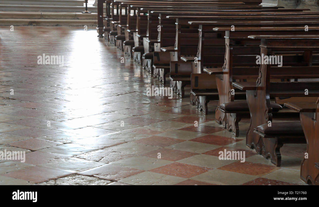 Empty church bench also called wooden pew without people Stock Photo ...