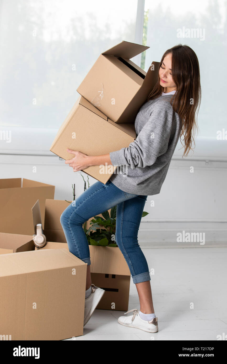 Carrying boxes hi-res stock photography and images - Alamy