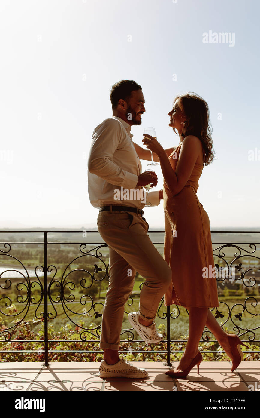 Two people talking on balcony hi-res stock photography and images - Alamy