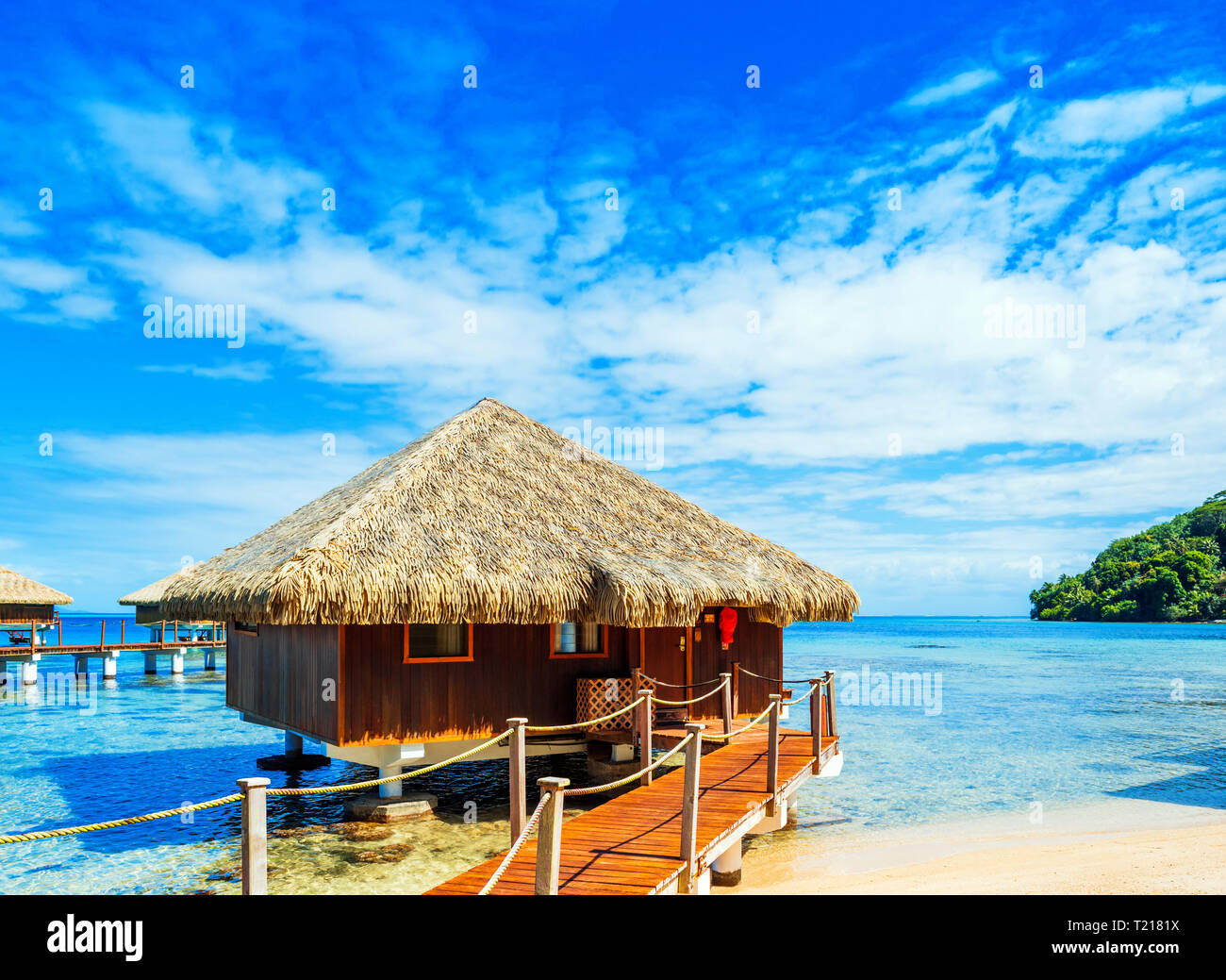 View of the bungalow in the lagoon Huahine, French Polynesia. Copy ...