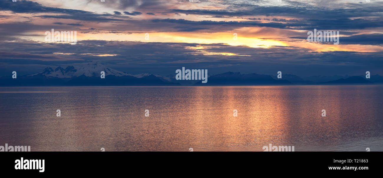 Panorama of beautiful sunset reflects across ocean viewed from city of ...