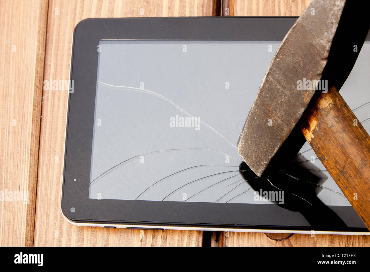 Smashed Screen Vandalised Broken Glass Close Up With Hammer Stock Photo ...