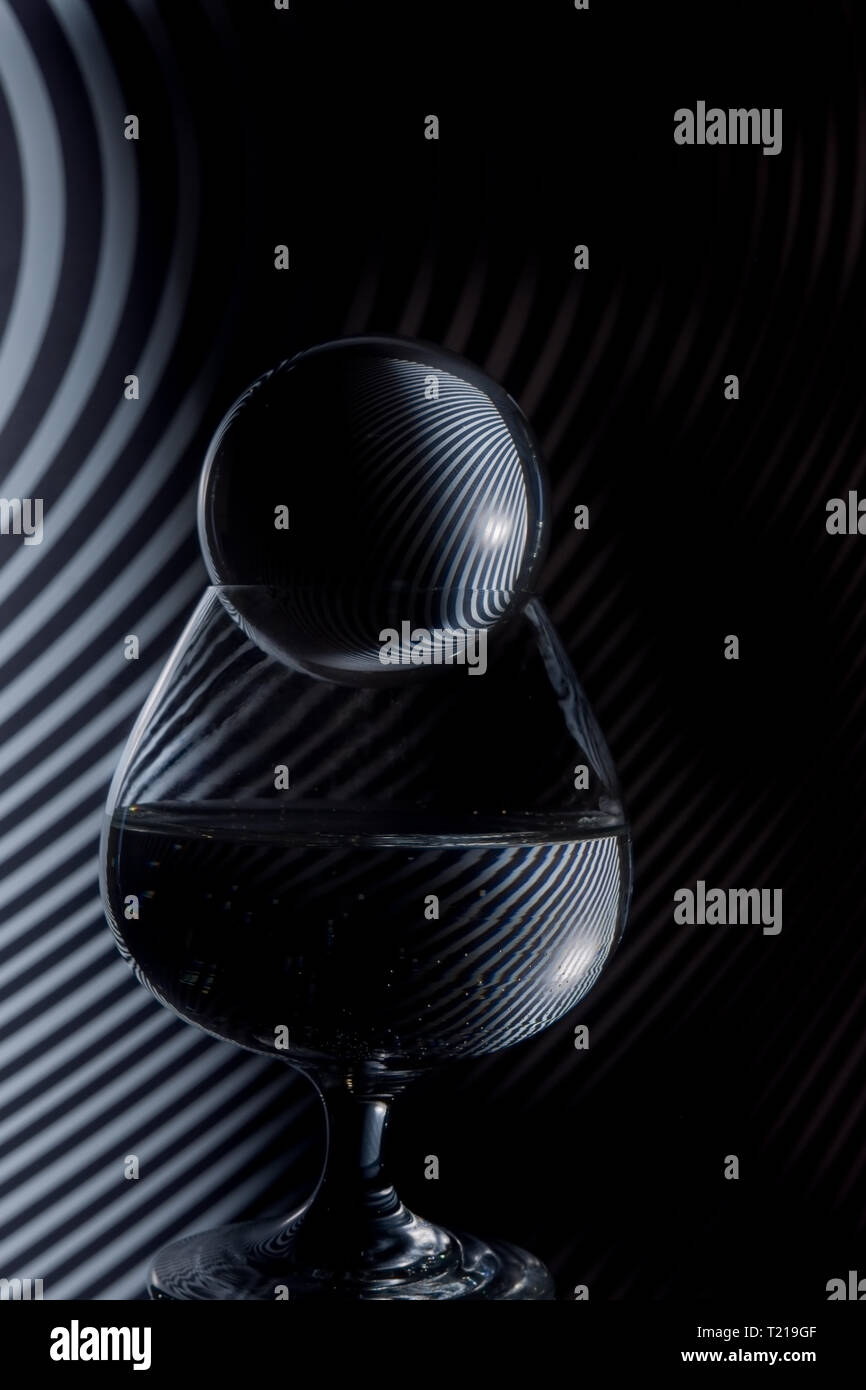 Graphic image of glass objects in light and shadow Stock Photo - Alamy