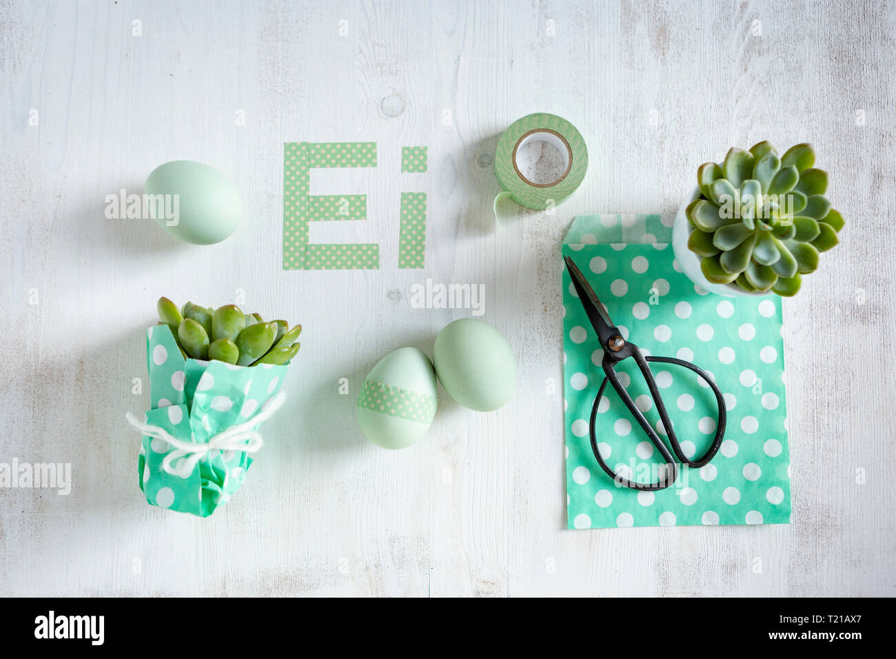 Tinkering with Easter eggs Stock Photo - Alamy
