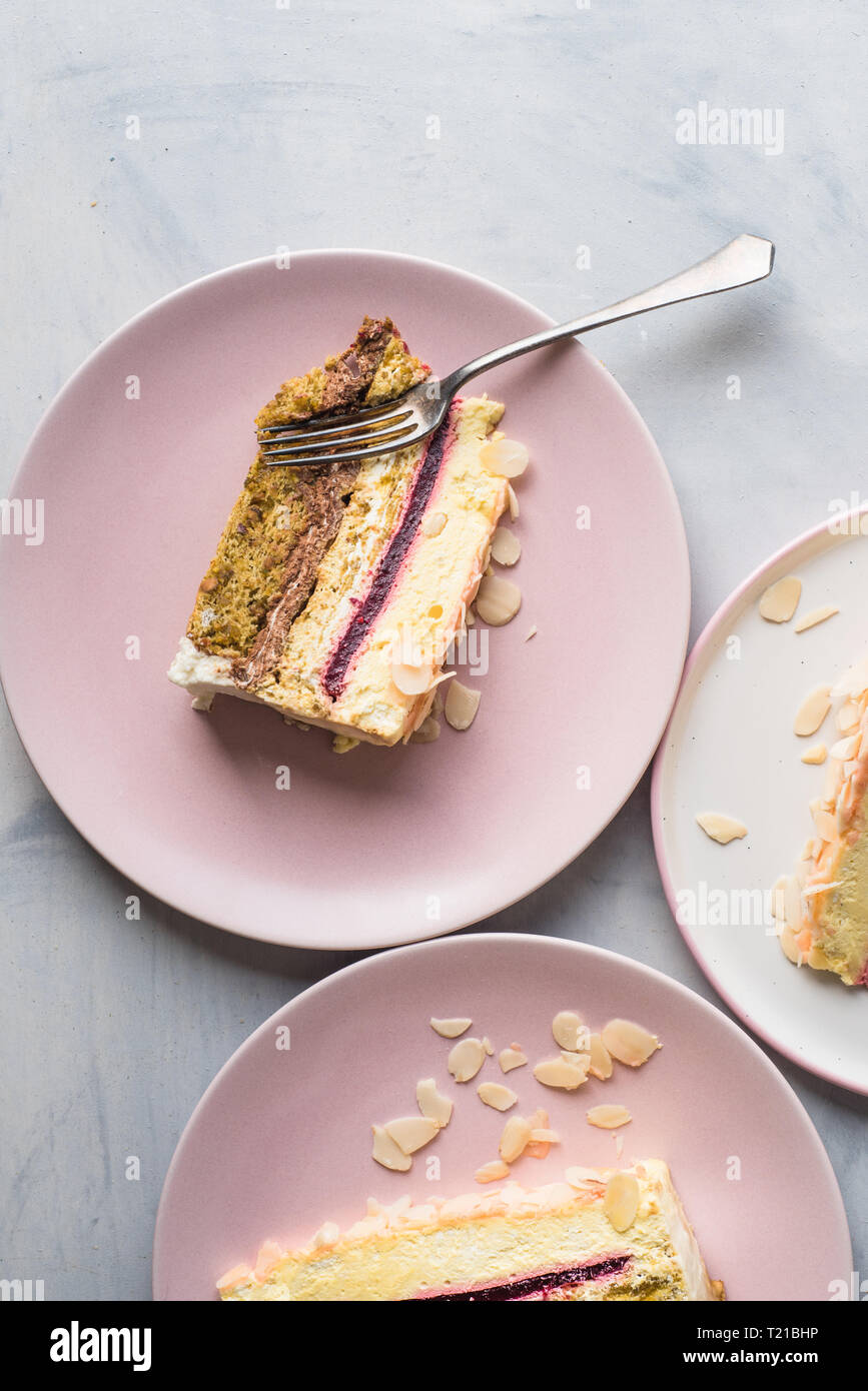 Overhead view of a slice of chocolate mousse cake on a pink plate Stock ...