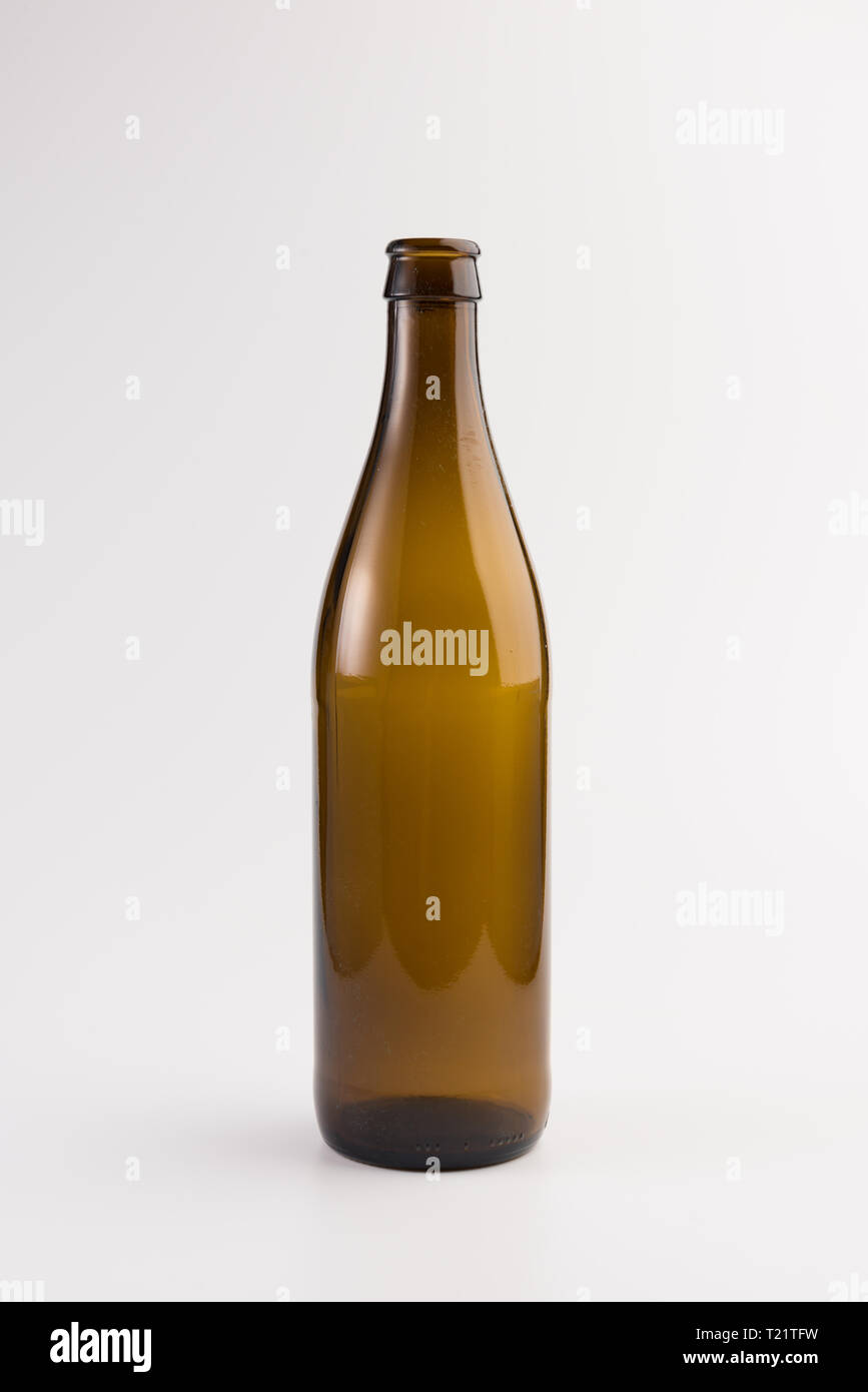 Empty beer bottle. Isolated on white background Stock Photo - Alamy