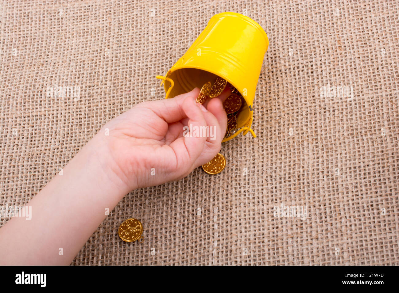 Coins in bucket hi-res stock photography and images - Alamy