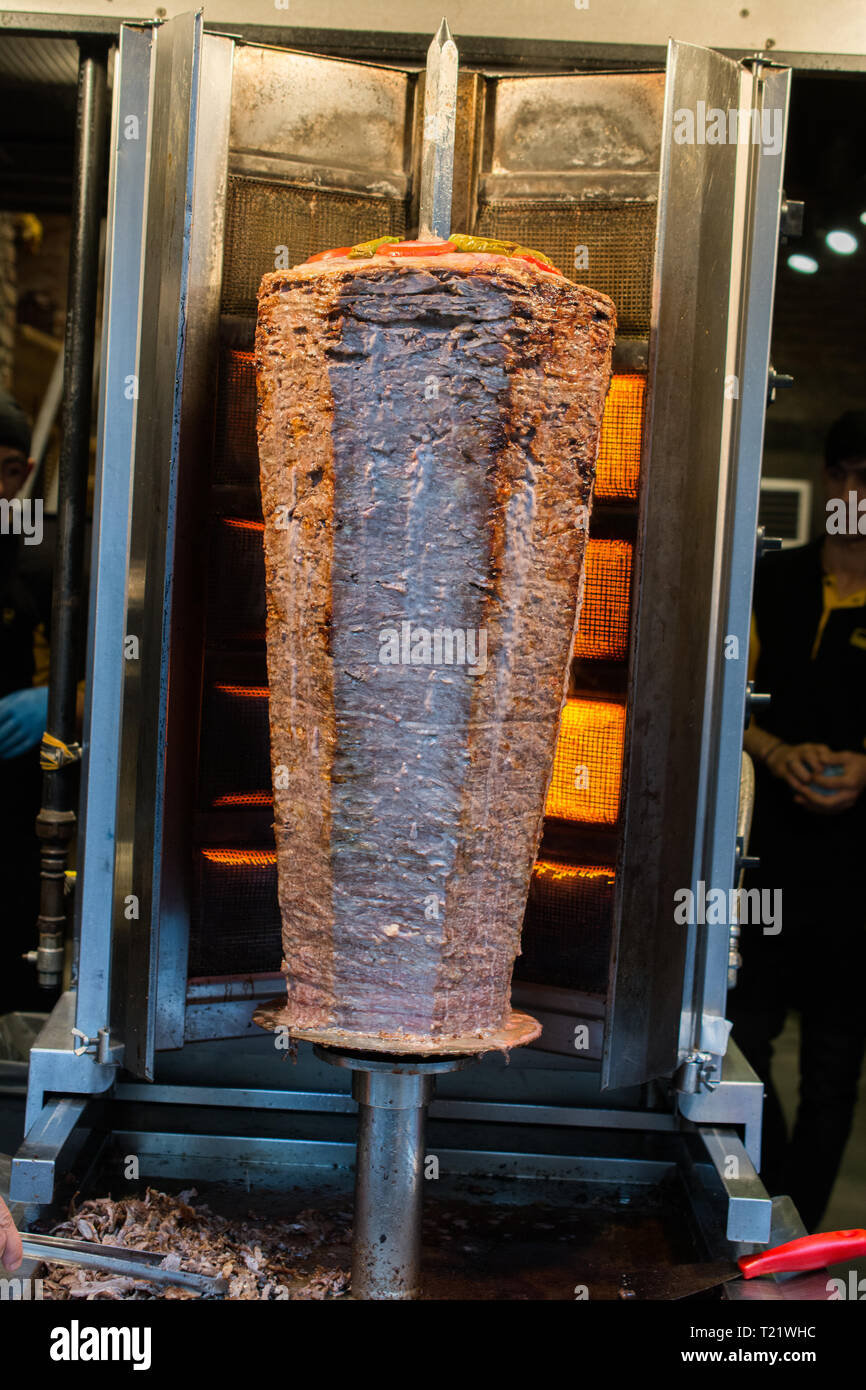 Traditional Turkish Doner Kebab on pole Stock Photo - Alamy