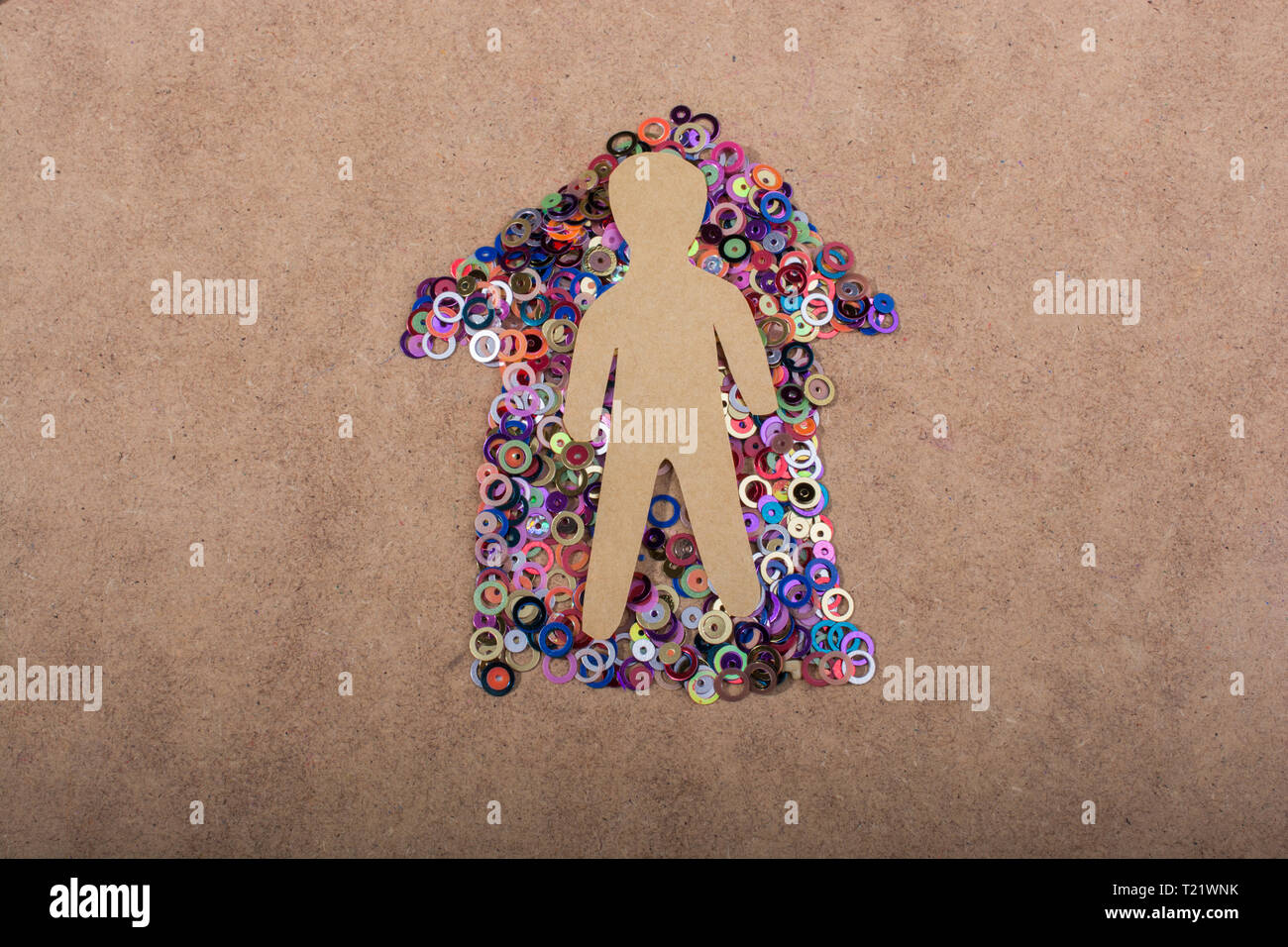 Man shape cut out of paper on an arrow sign Stock Photo - Alamy