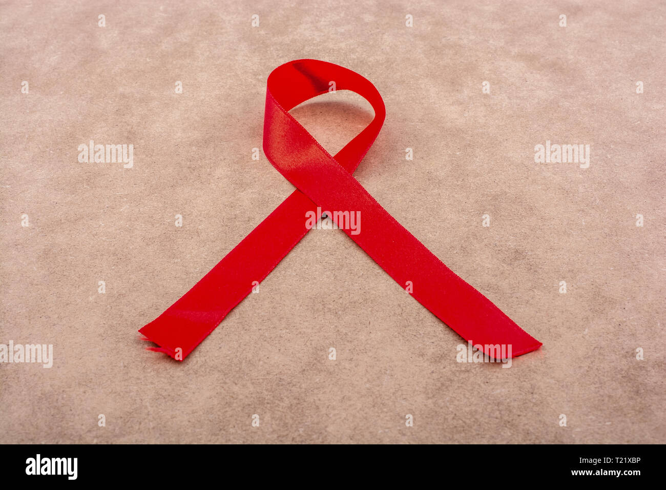 Ribbon of red color on plain background in view Stock Photo - Alamy
