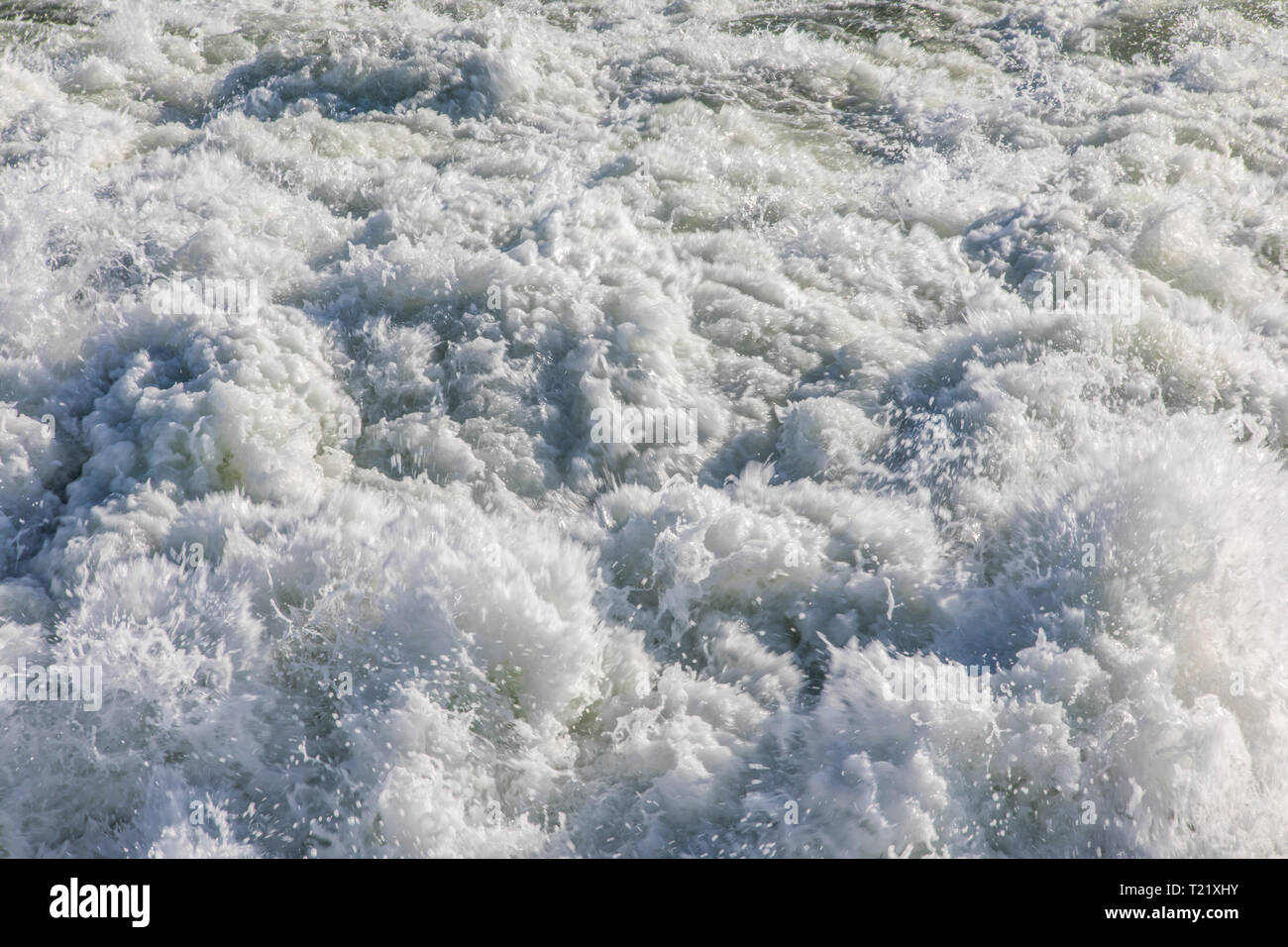 Stern wave, stern water, wake of a motor boat, turbulence of water ...