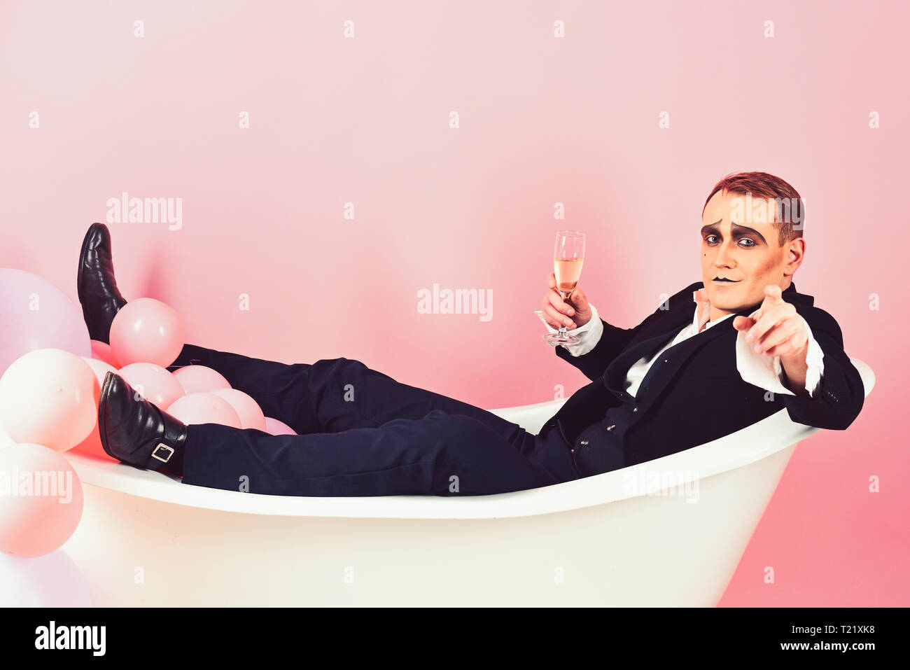 Will you join me. Mime actor enjoy bathing in bath tub. Bathing and ...