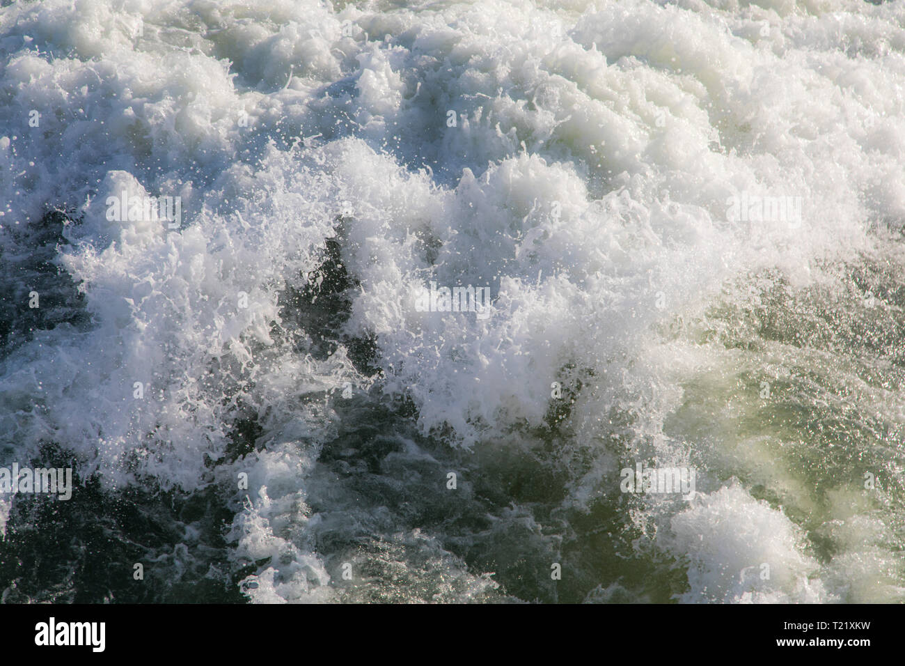 Stern wave, stern water, wake of a motor boat, turbulence of water ...