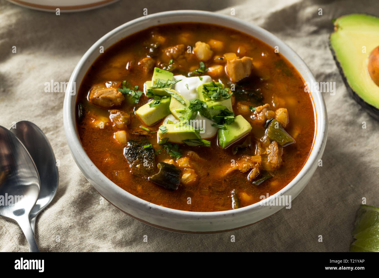 Homemade Mexican Pozole Soup with Chicken and Avocado Stock Photo - Alamy