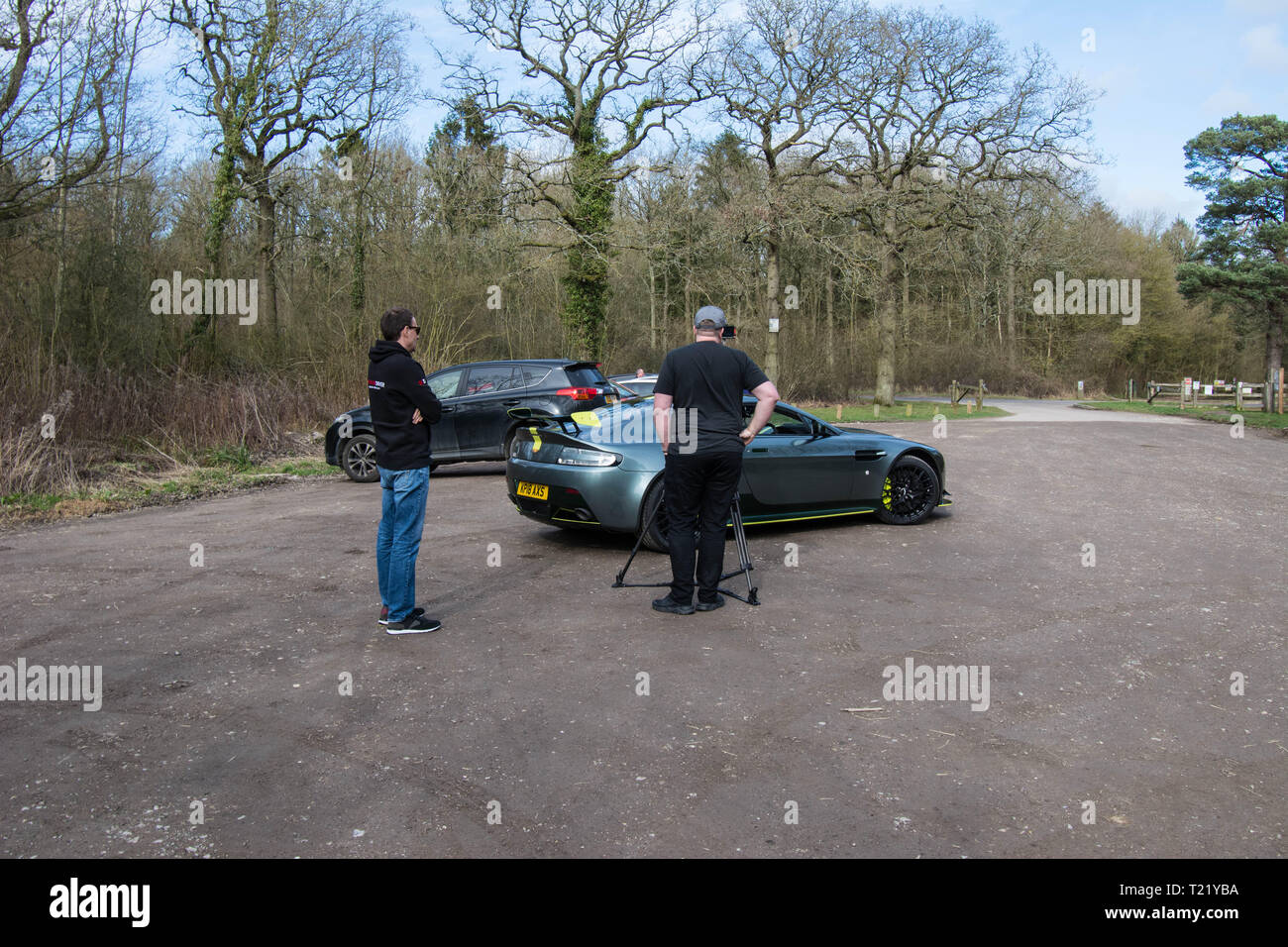 Film crew with Aston Martin Salcey forest car park Northamptonshire UK ...