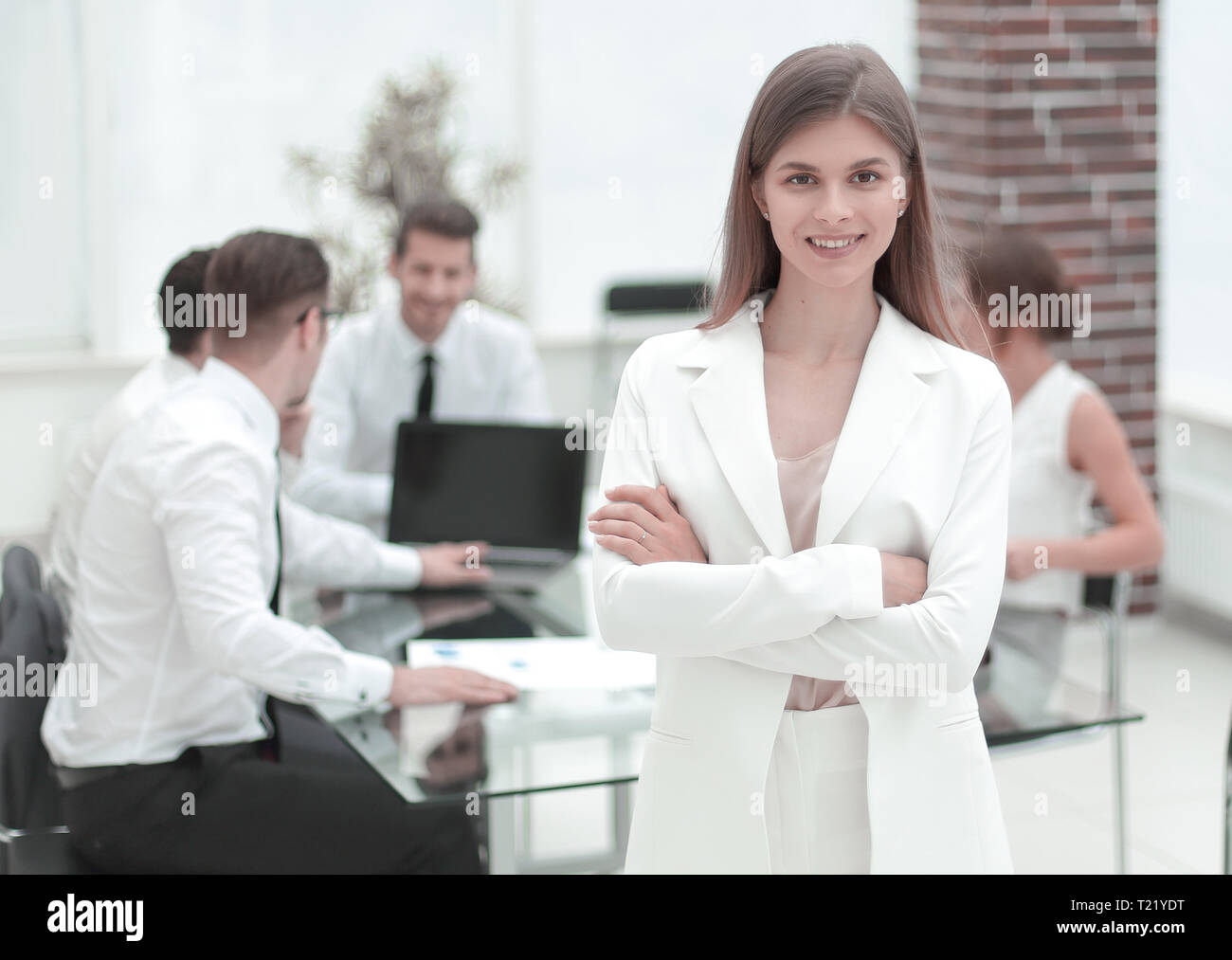 young employee standing in the office Stock Photo - Alamy
