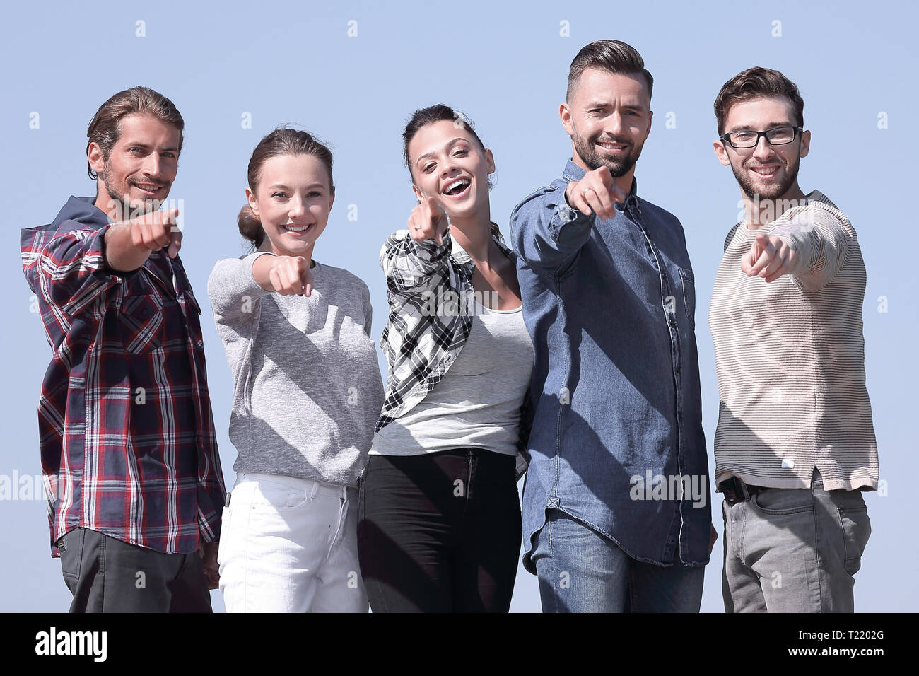 confident young people showing hands forward Stock Photo - Alamy