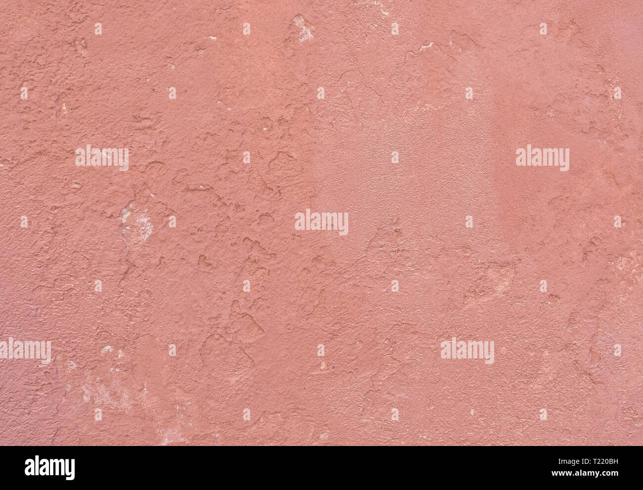 Grungy red roughcast wall scratchy background texture toned in trend ...