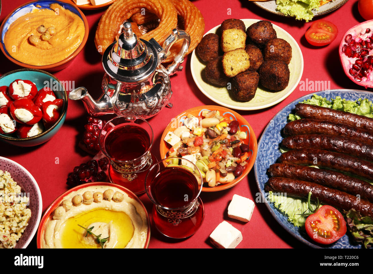 Middle eastern or arabic dishes and assorted meze, concrete rustic ...