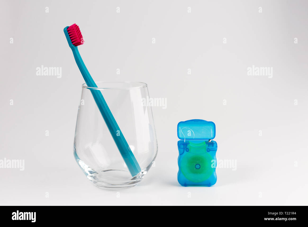 Daily oral hygiene - dental floss and toothbrush for healthy of teeth ...