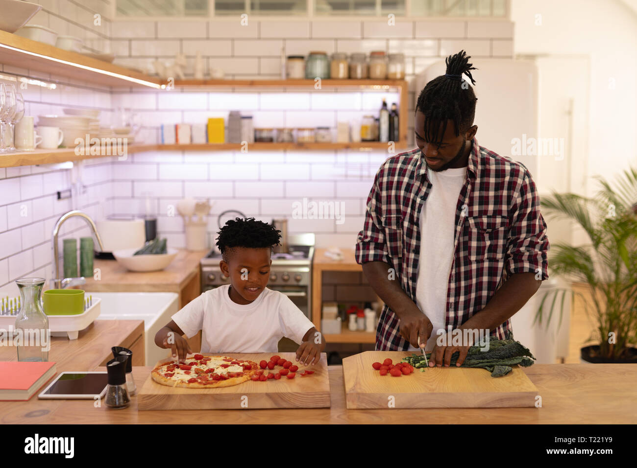 Father and son in kitchen hi-res stock photography and images - Alamy