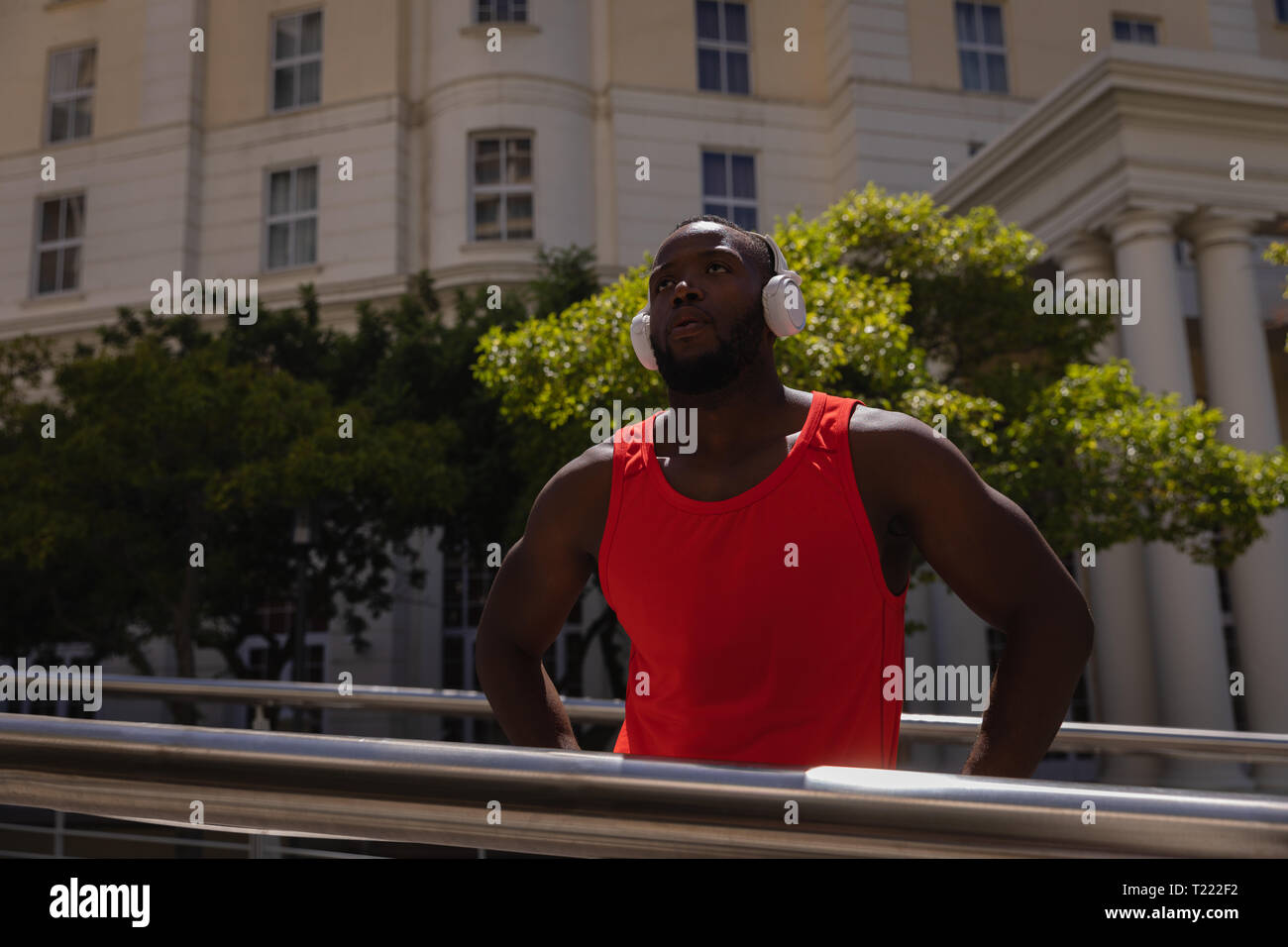 Man on railing hi-res stock photography and images - Alamy