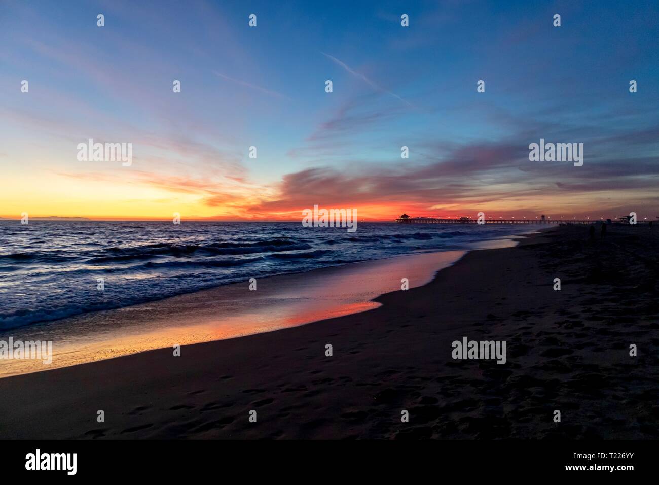 Sunset over the ocean Stock Photo - Alamy