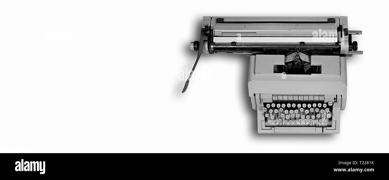 Old typing machine on white background Stock Photo - Alamy