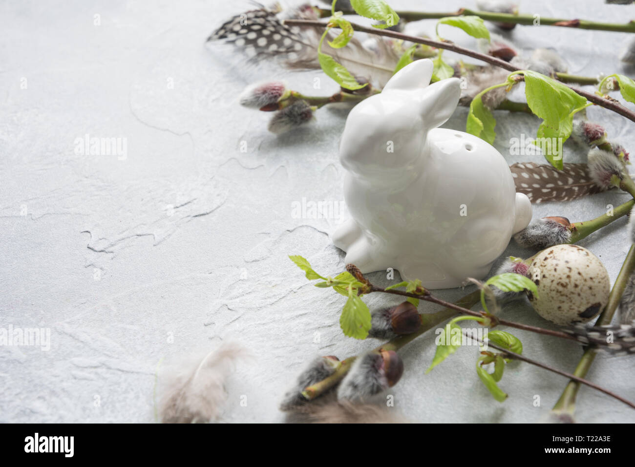 Easter bunny and spring willow on vintage table. Space for text Stock ...