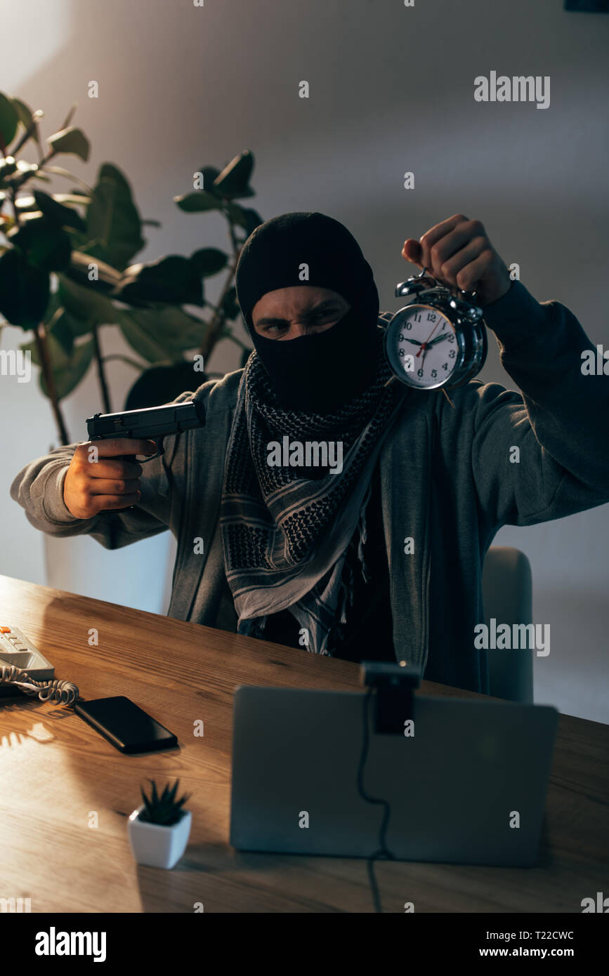 Angry man gun clock hi-res stock photography and images - Alamy